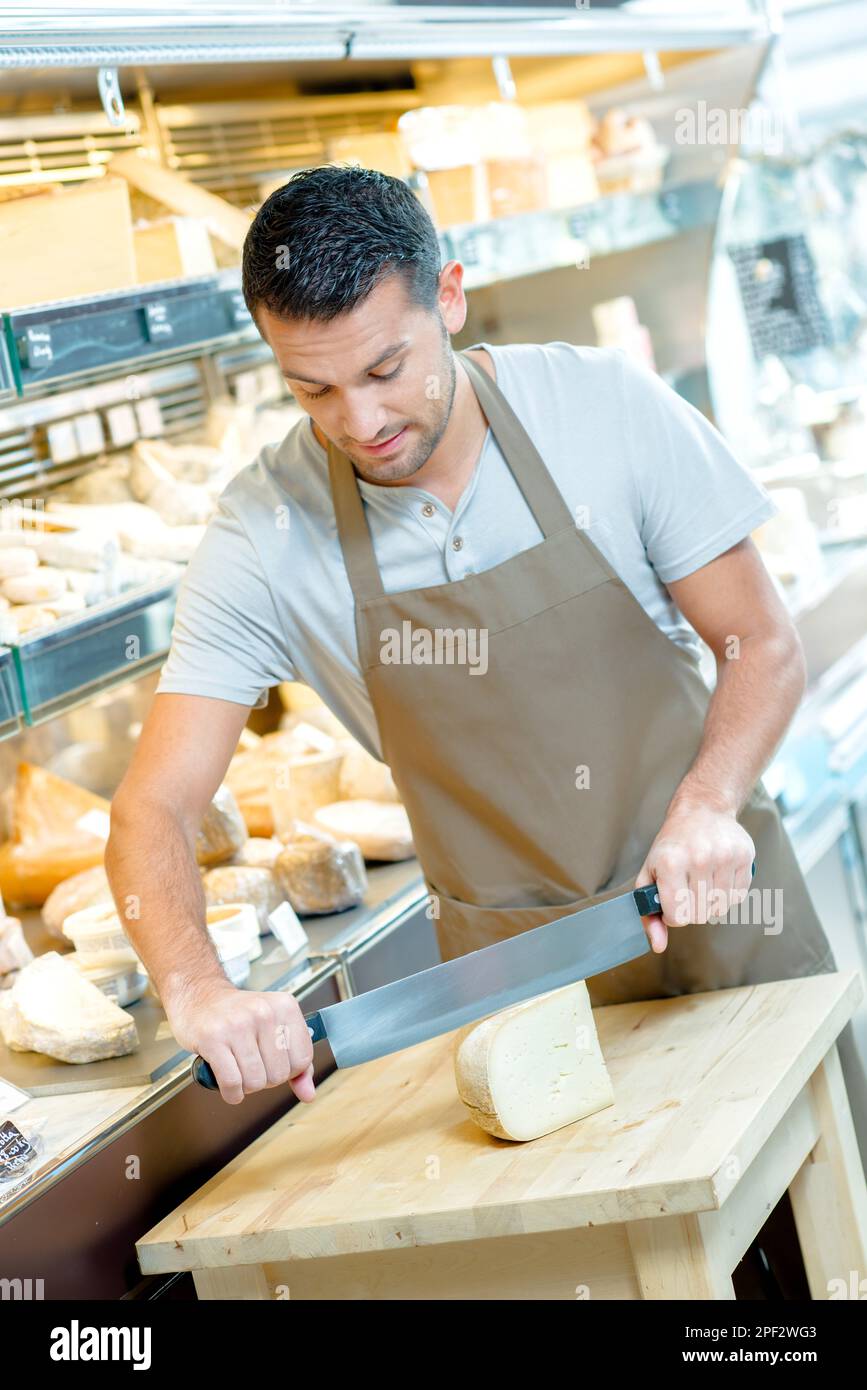 Deli worker hi-res stock photography and images - Alamy
