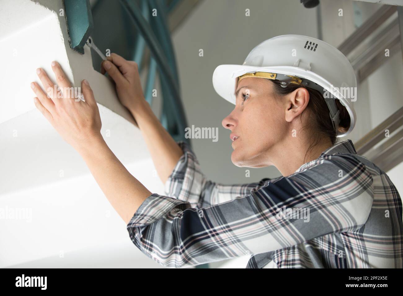 Installing insulation office hi-res stock photography and images - Alamy