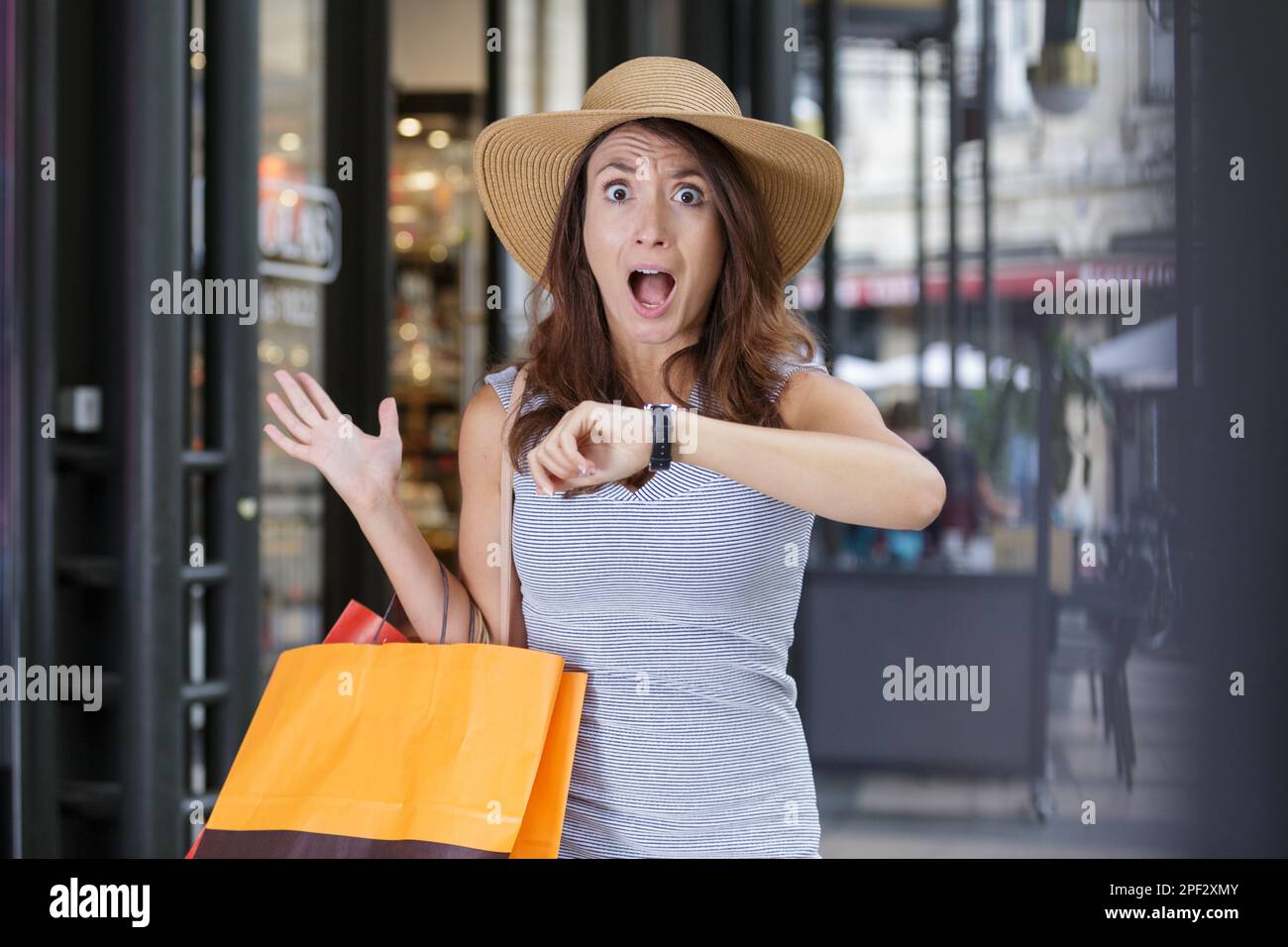 portrait of upset woman because she is late Stock Photo - Alamy