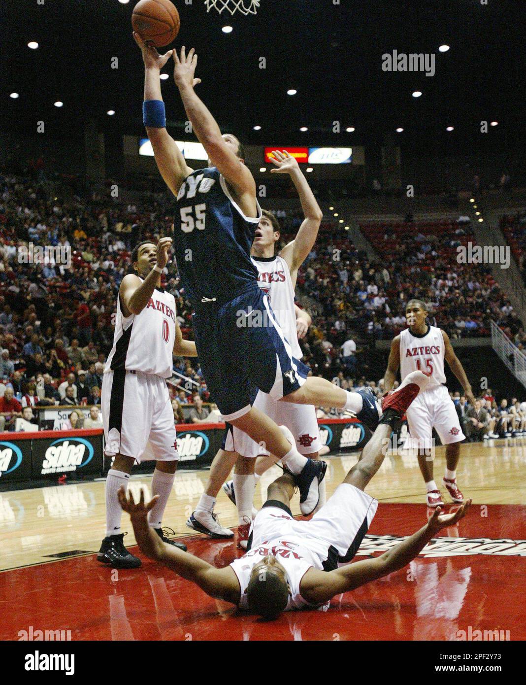 Brigham Young's Rafael Araujo barrels over San Diego State's Aerick ...