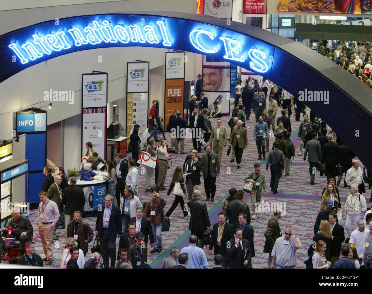 Persons walk to the the show floor at the 2004 International Consumer ...