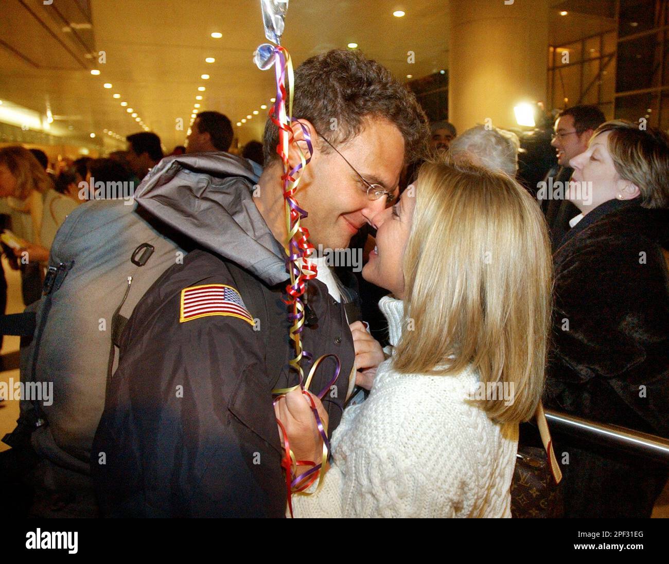 Dr. Mark Waltzman, left, and his girlfriend Ellen Davidson, right, both ...