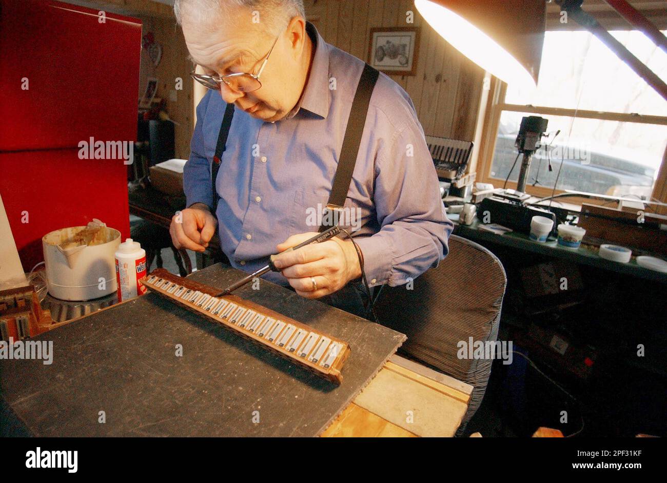 Dale Wise of Burr Hill, Va., applies a natural beeswax mixed with ...
