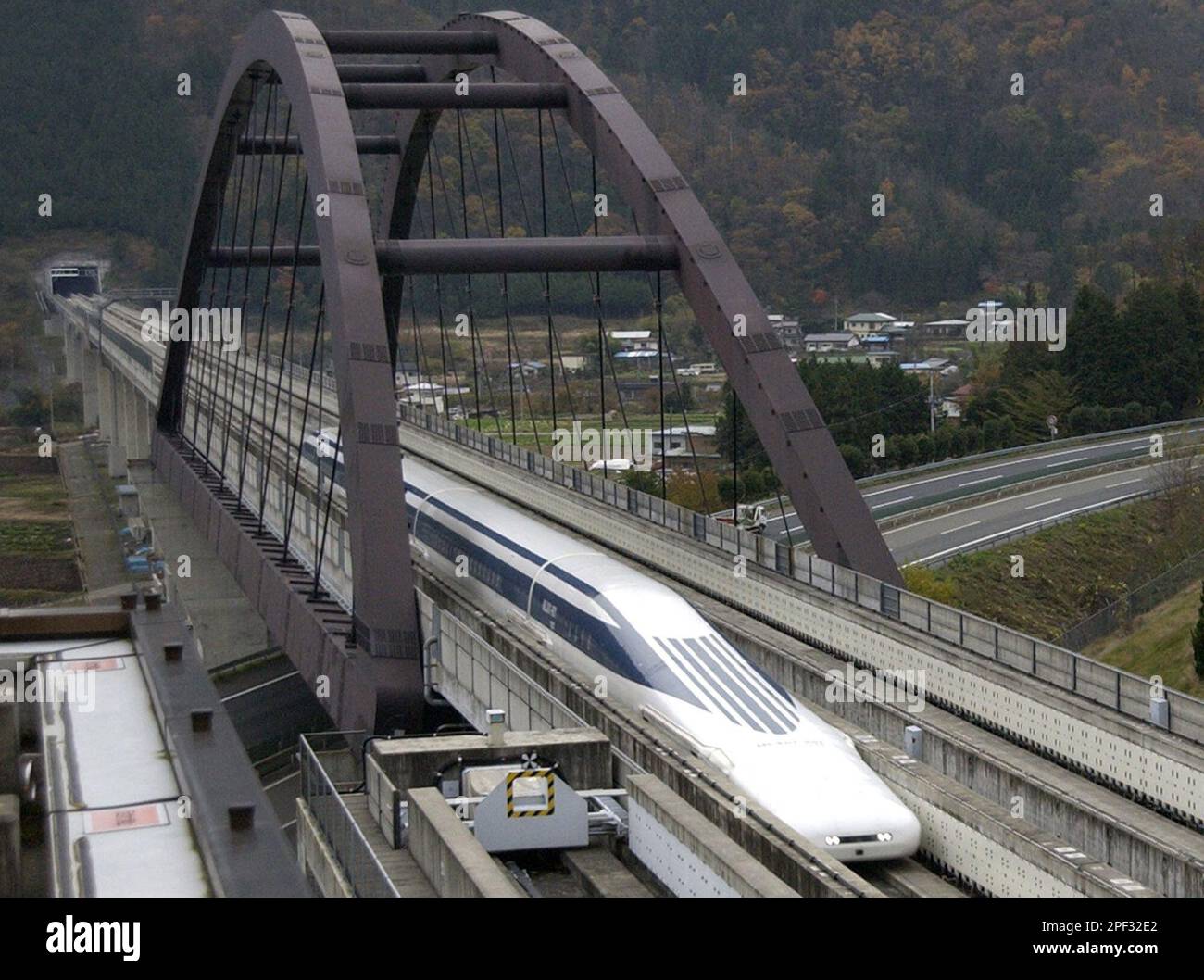 A test model MLX01-901 maglev train runs on the 18.4-kilometer (11.4 ...