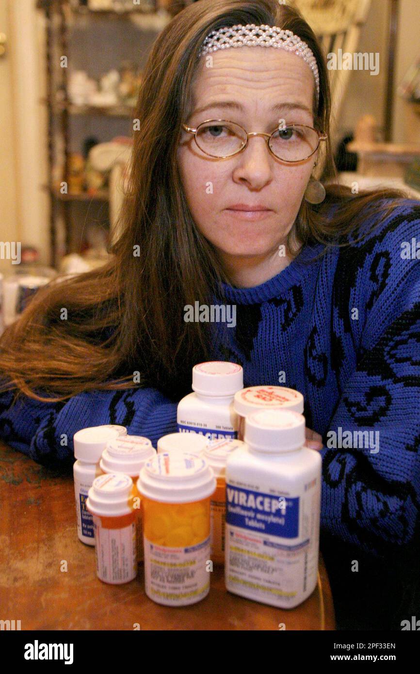 Audrey Serrano, 41, of Fitchburg, Mass., poses for a portrait with a ...