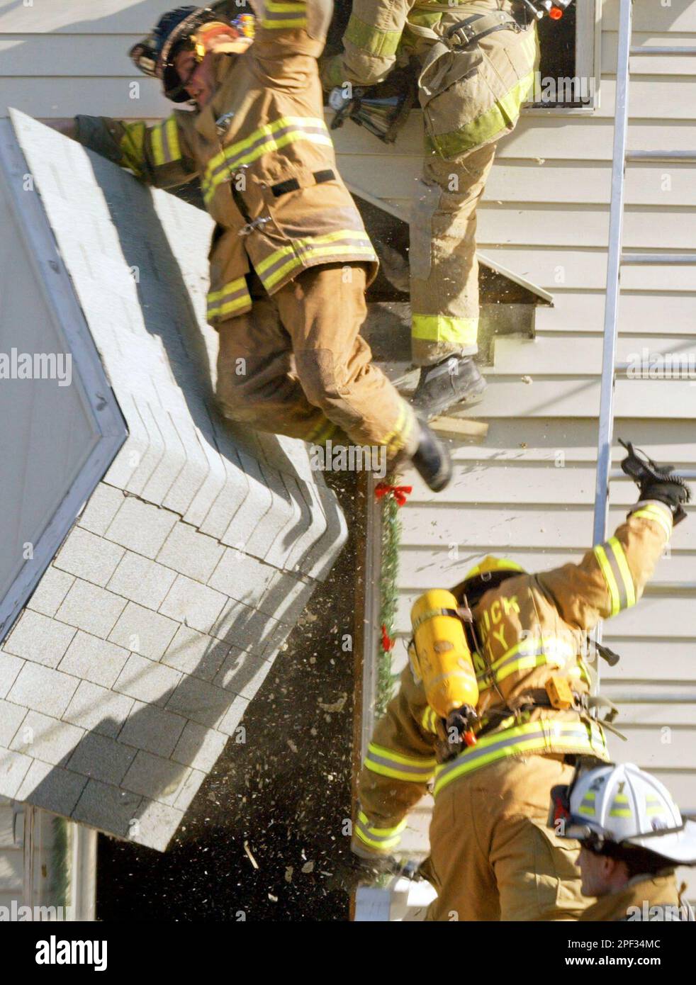 Three Frederick County, Va. firefighters tumble to the ground Monday ...