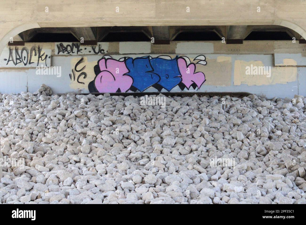 Graffiti under a bridge Stock Photo - Alamy