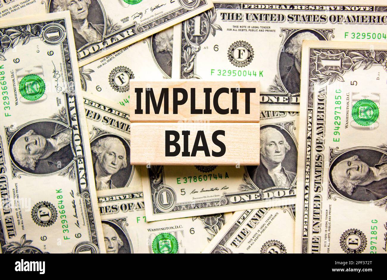Implicit bias symbol. Concept words Implicit bias on wooden block ...