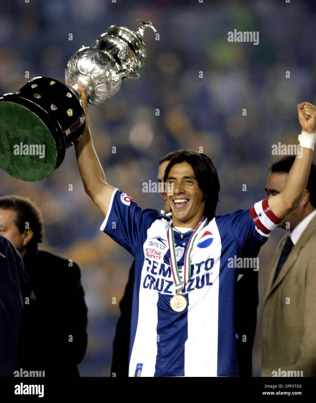 Pachuca's Alberto Rodriguez holds the Cup after defeating Tigres on ...