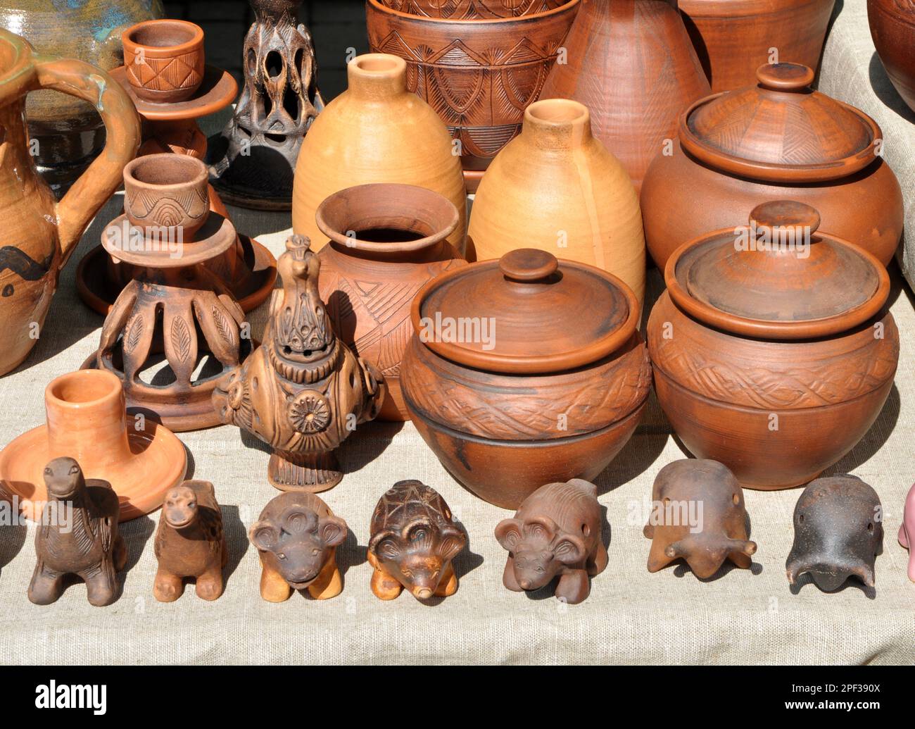A variety of pottery made by folk craftsmen from clay Stock Photo - Alamy