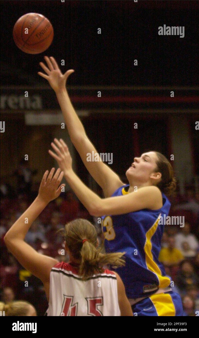 UC Santa Barbara center Lindsay Taylor, top right, makes her shot over ...