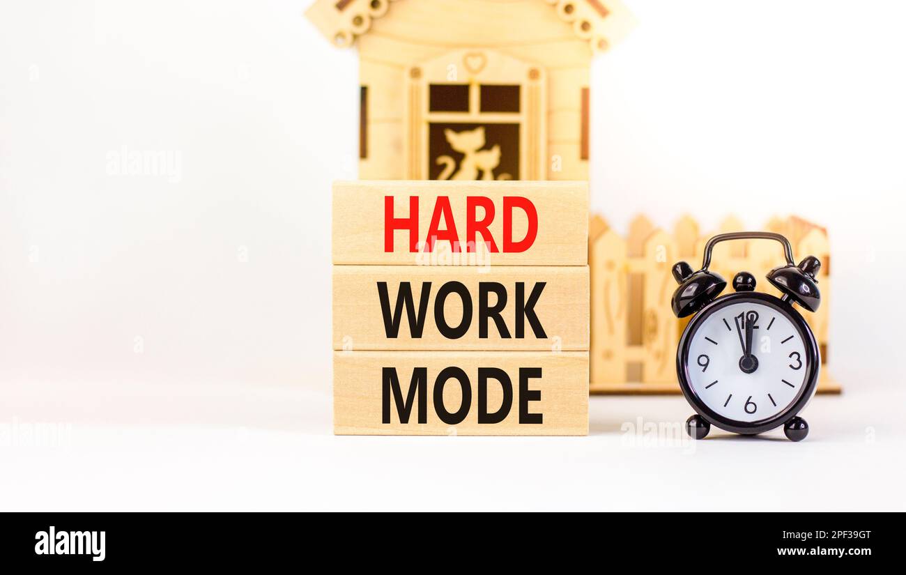 Hard work mode symbol. Concept words Hard work mode on wooden block on ...