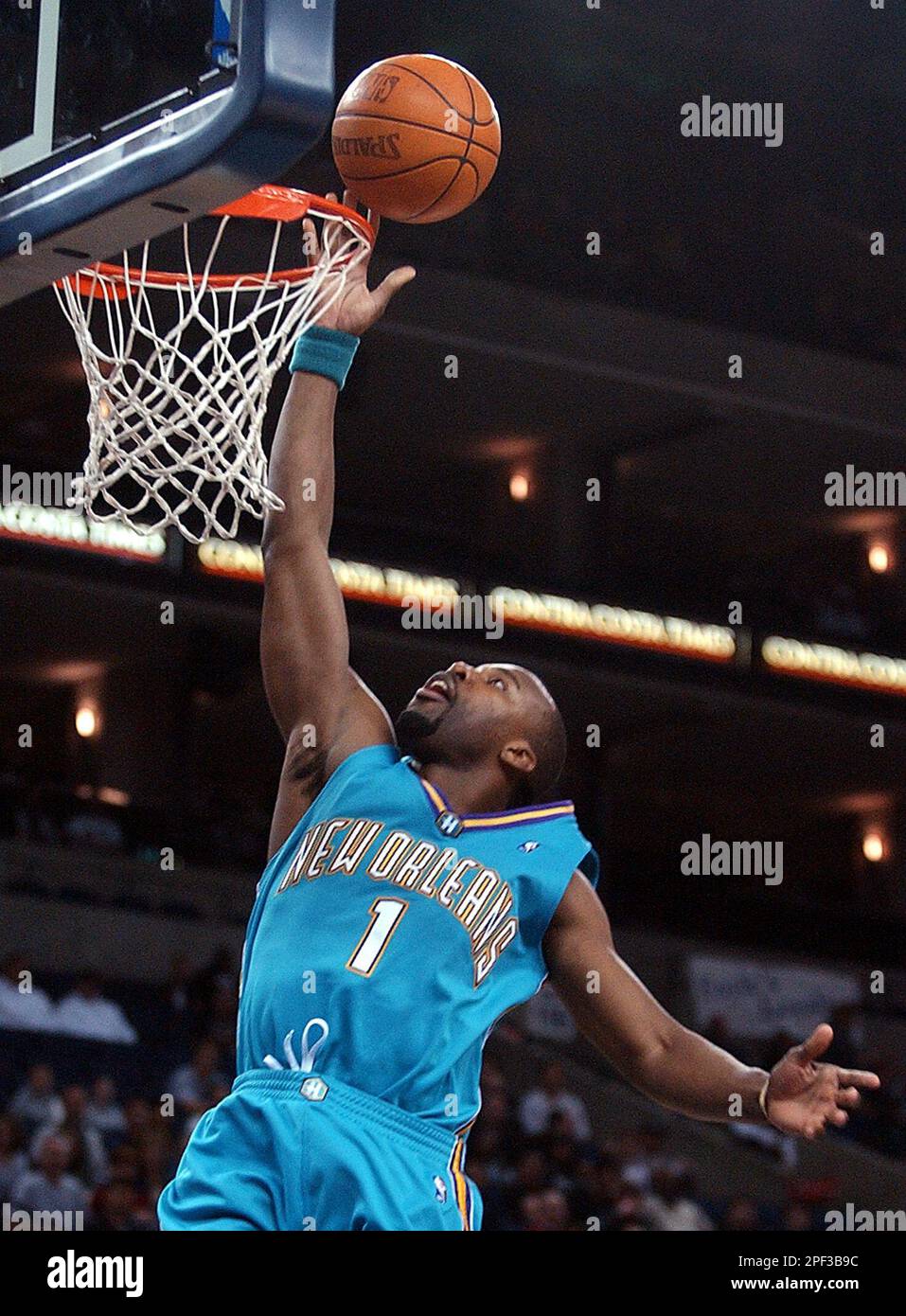 New Orleans Hornets' Baron Davis lays the ball in against the Golden ...