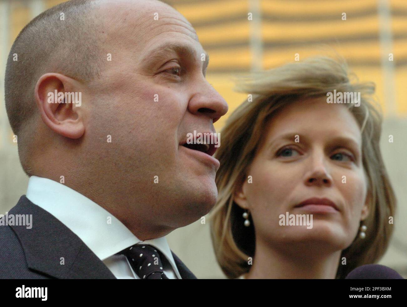 Former Maryland State Police Chief Edward Norris, with his wife Kathryn, looking on, makes a ...