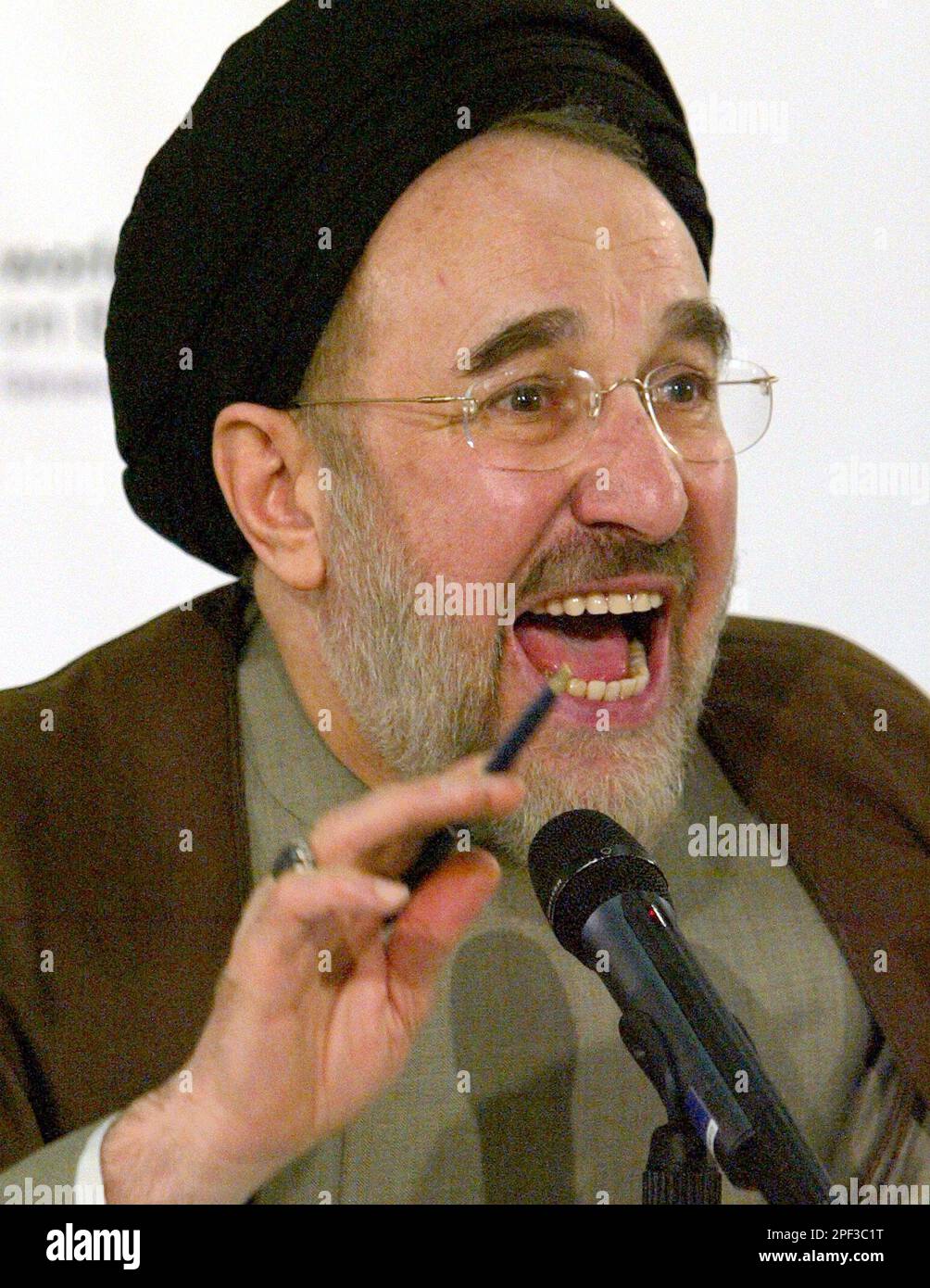 Iranian President Mohammad Khatami gestures during a press conference ...