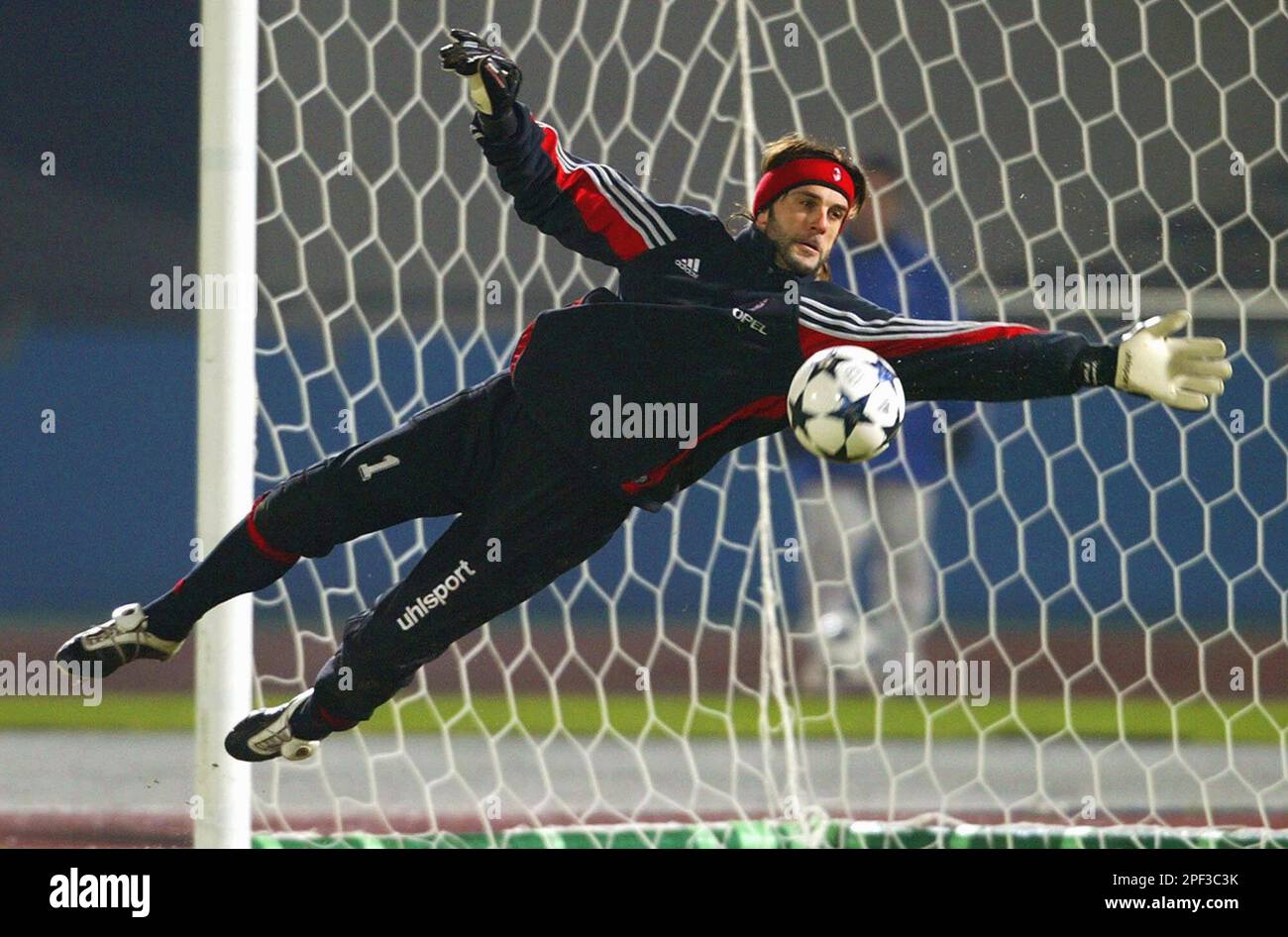 AC Milan's Valerio Fiori leaps to block the ball during the team's ...