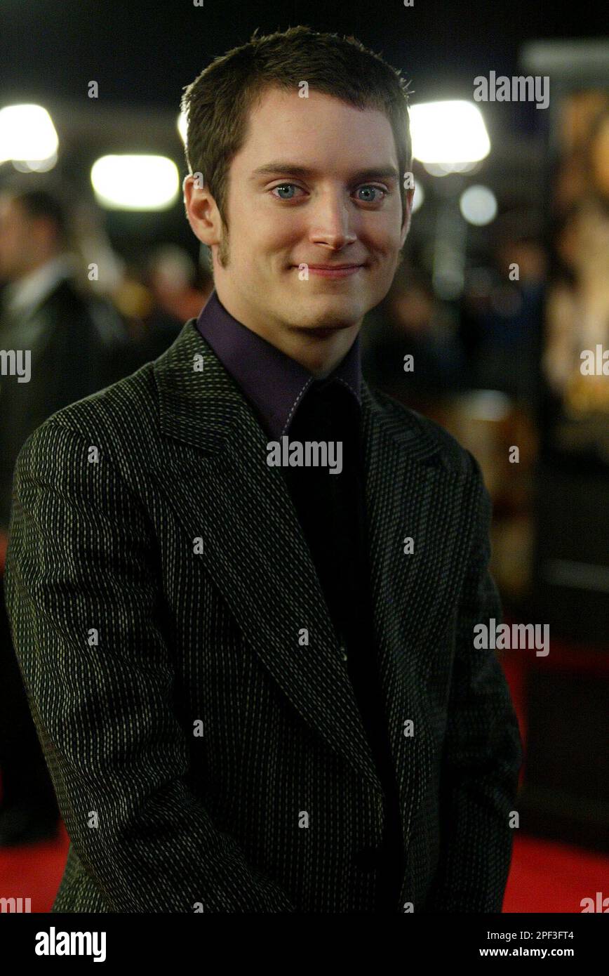 Actor Elijah Wood poses as he arrives for the world premiere of "Lord ...