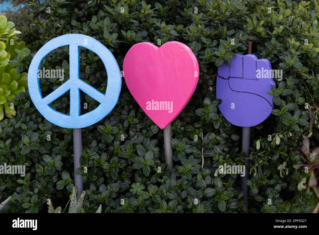 Colorful, wooden signs symbolizing peace, love and respect Stock Photo ...