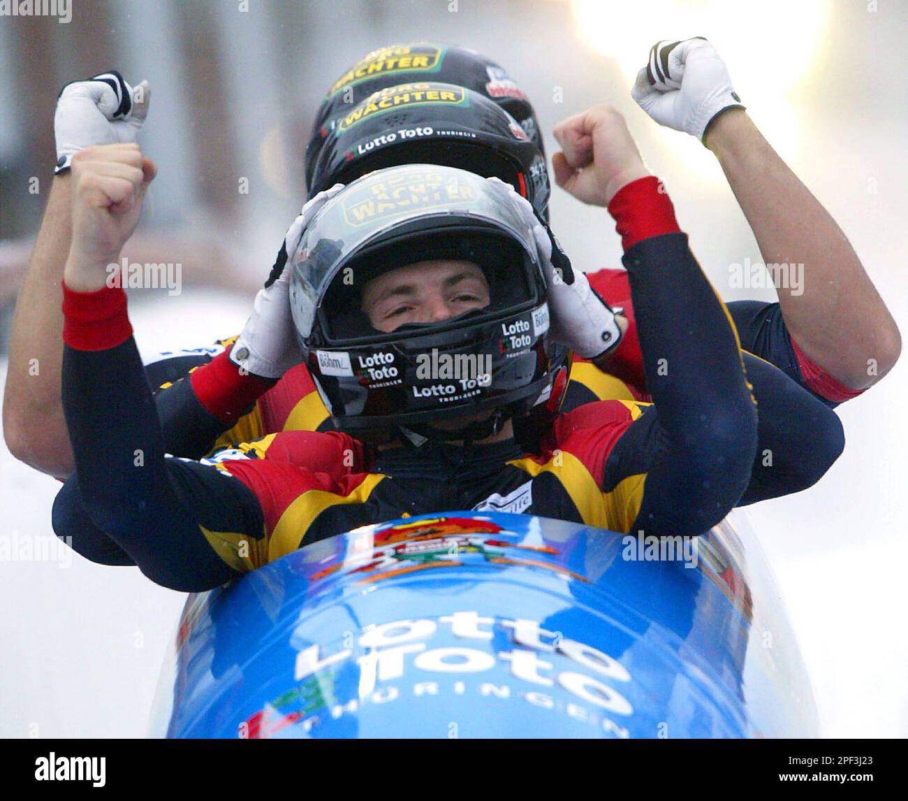 The Germany 1 four-man bobsled team, piloted by Andre Lange, with Rene ...