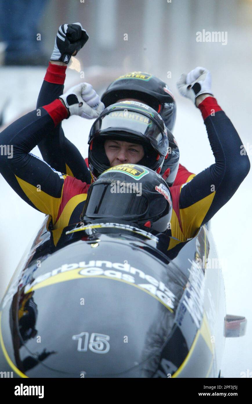 German four-man bobsled team driver Matthias Hopfner with Marc Kuhne ...