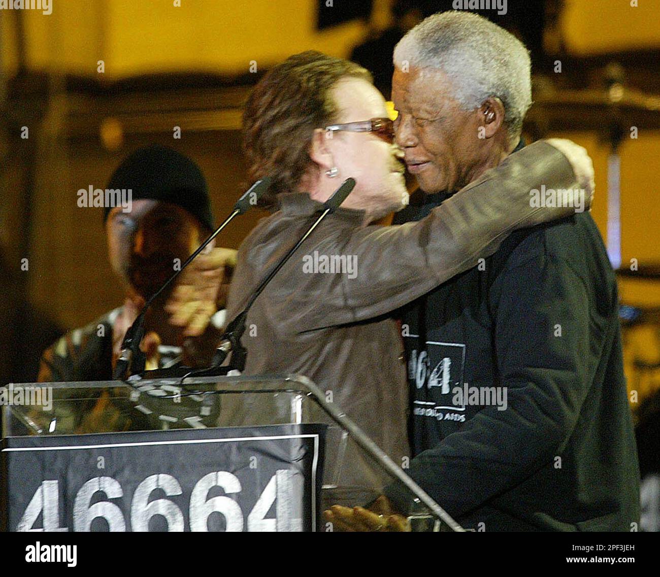Former South African President Nelson Mandela is hugged by U2 lead ...