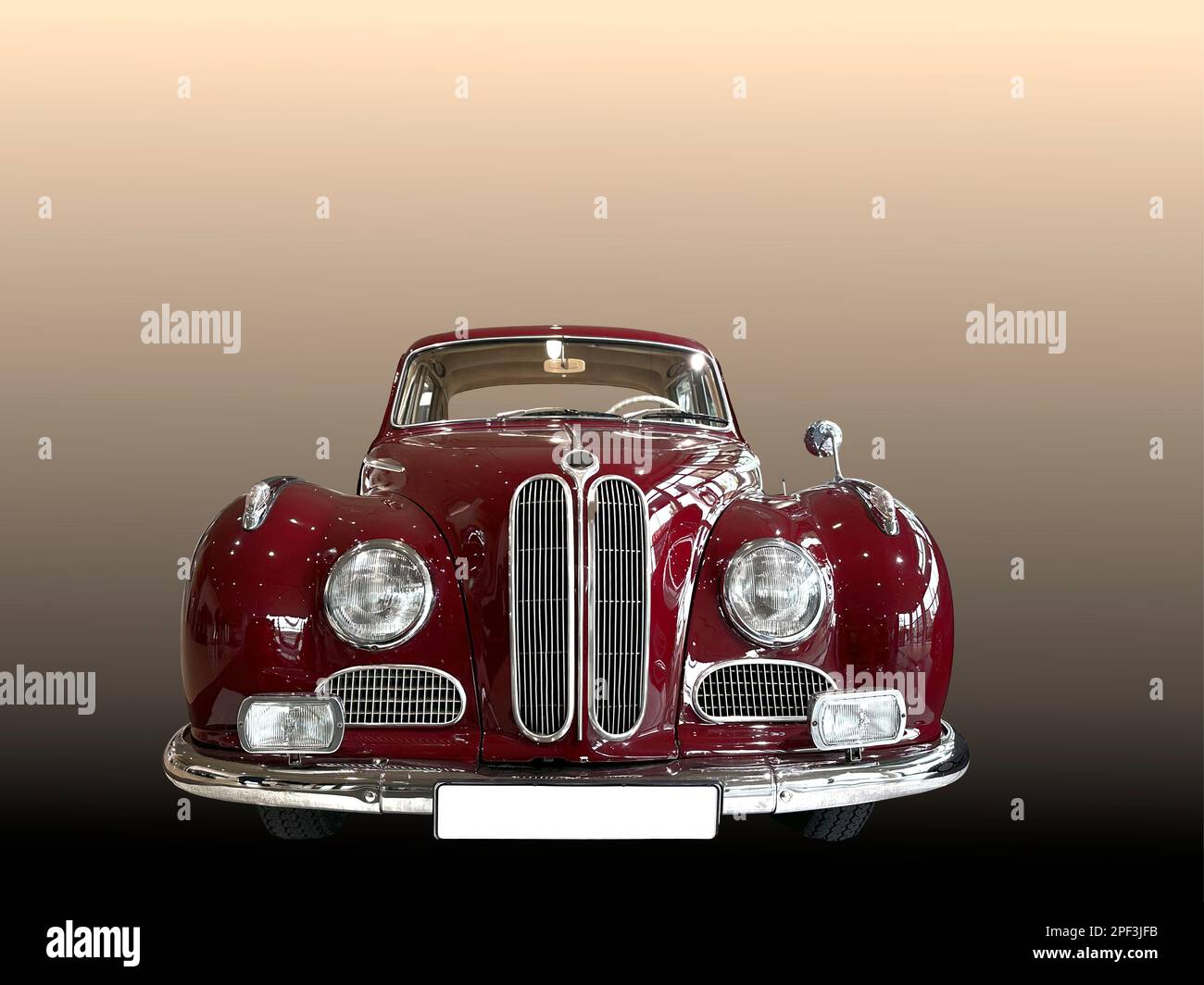 A beautiful oldtimer german vintage car in a bordeaux-red color Stock ...