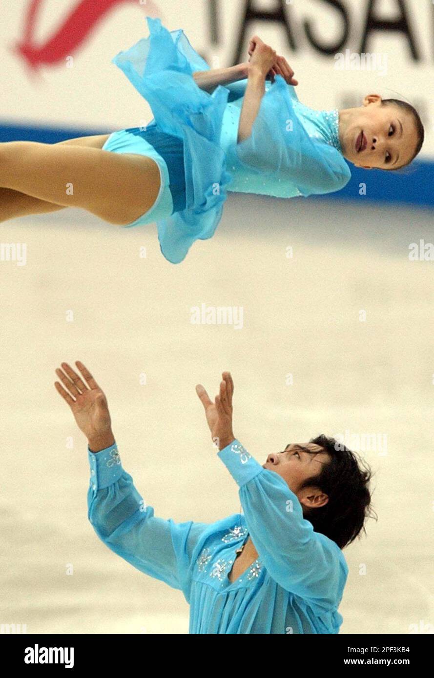 China's Yang Ding and Zongfei Ren perform during the pairs short ...