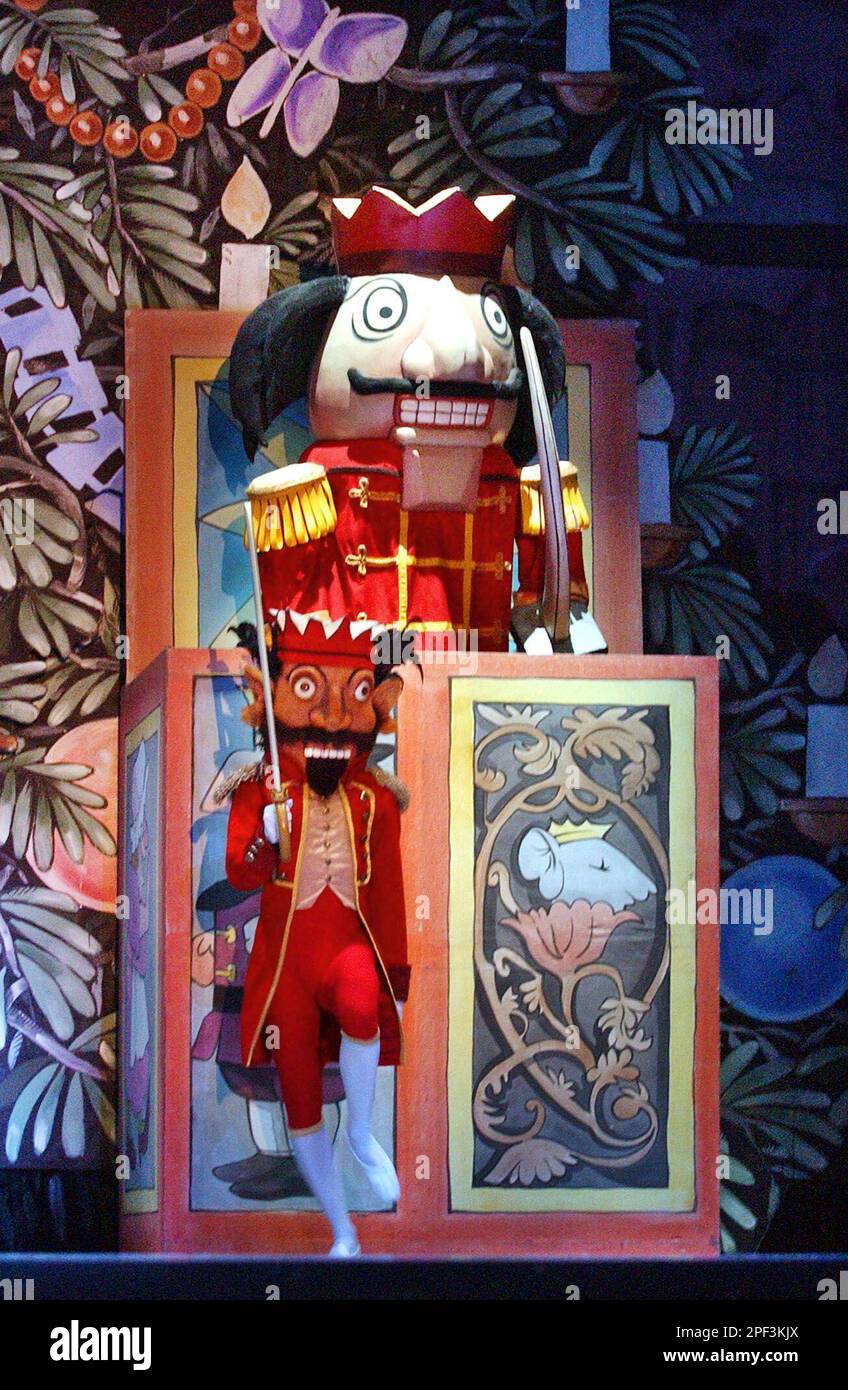 The character portraying the Nutcracker marches on stage at a rehearsal ...
