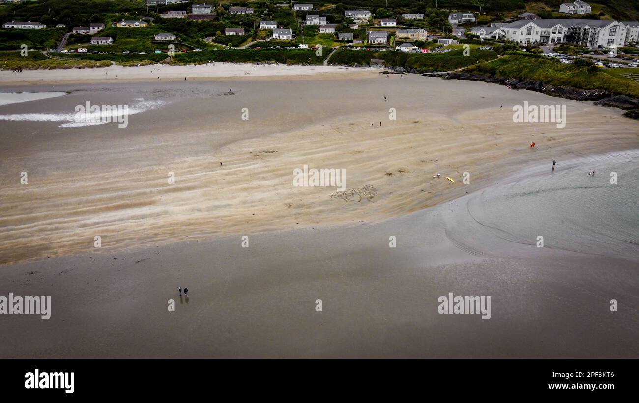 The famous Irish beach of Inchydoney at low tide, top view. Houses on ...