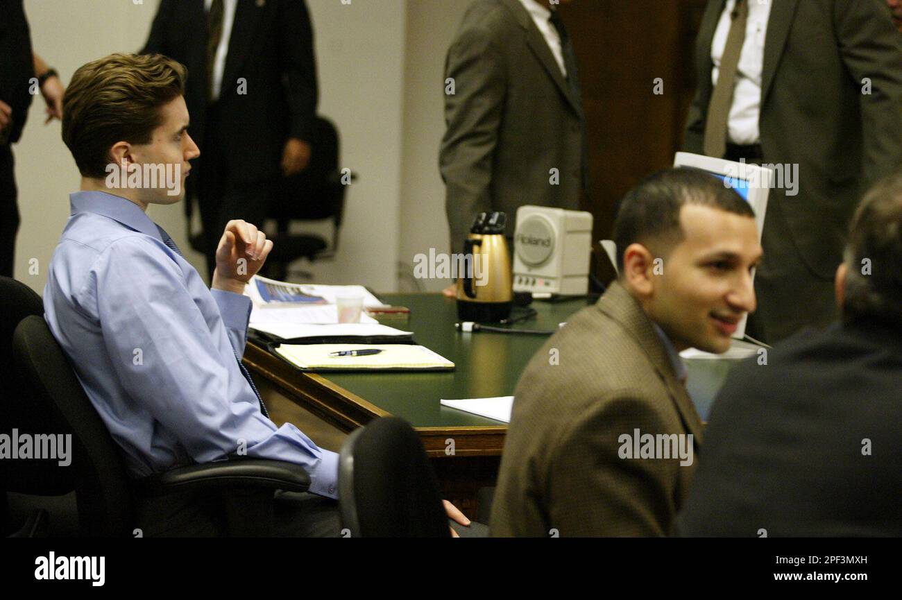 Sebastian Burns, left, and Atif Rafay, right, sit in a King County ...