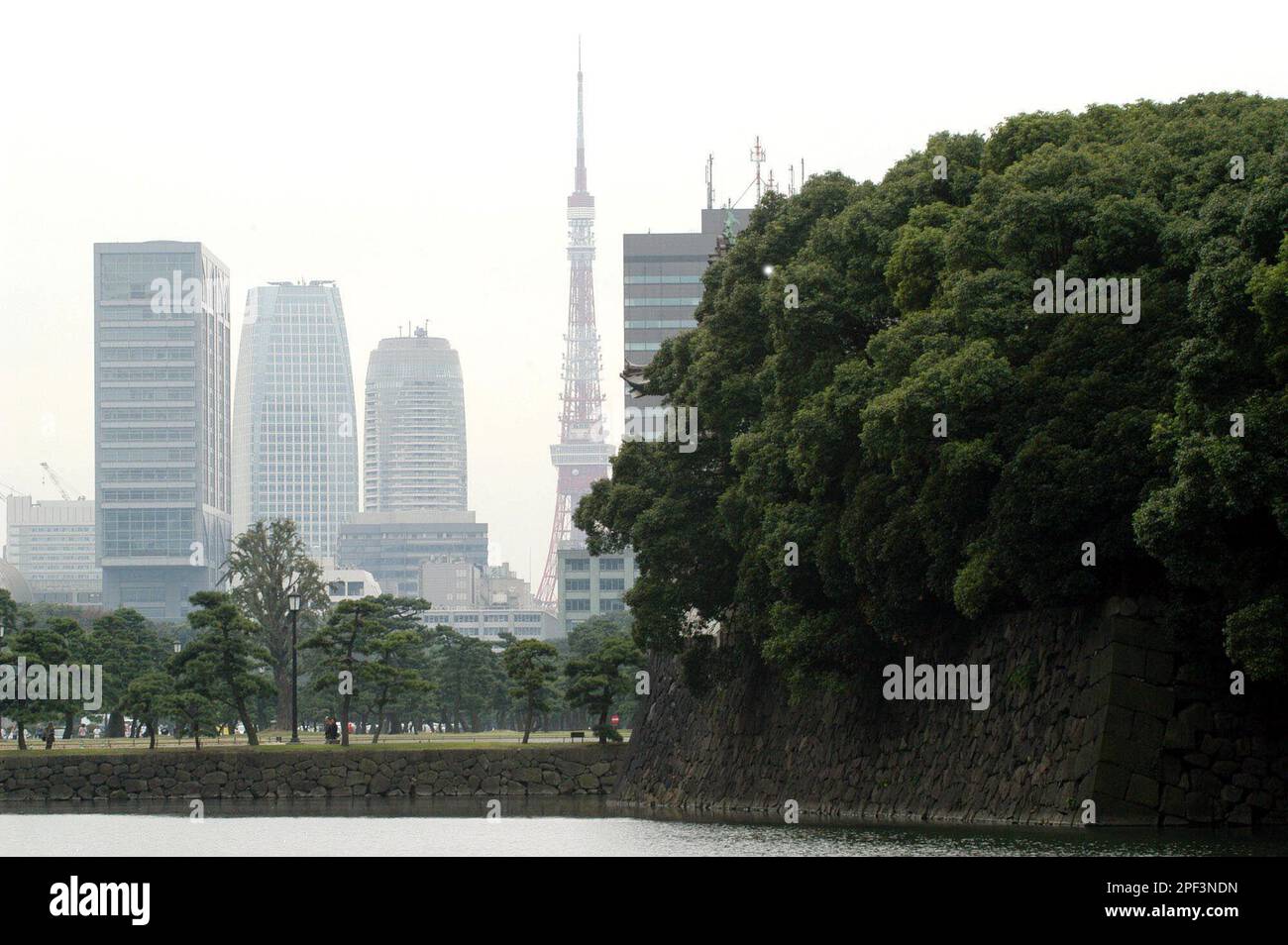 Thick green covers the moat-encircled Imperial Palace compound with the ...