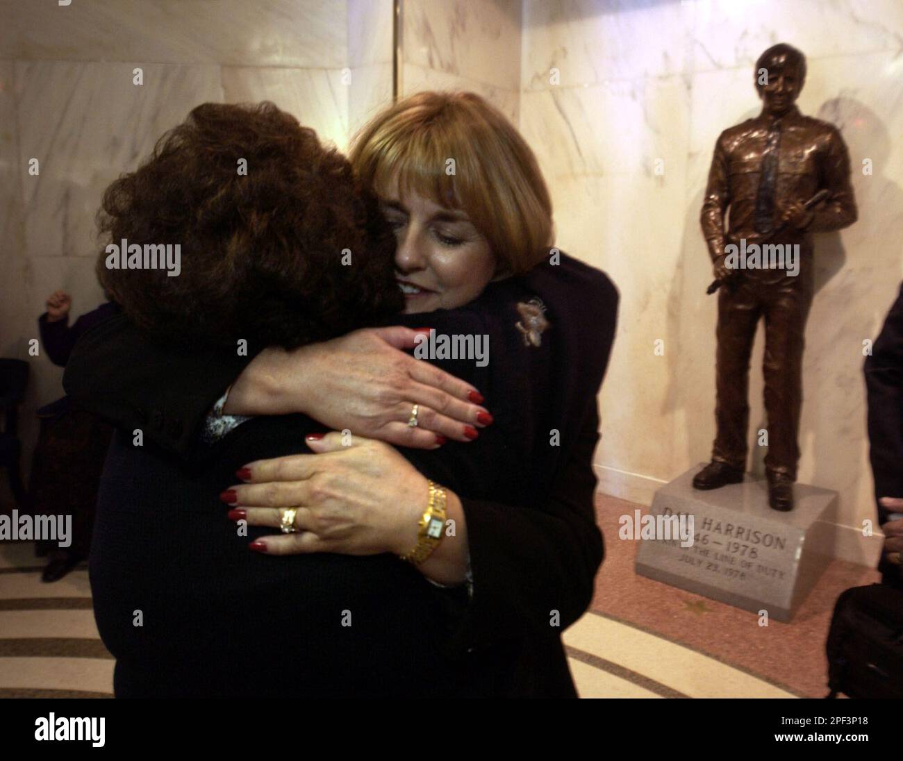 Alicia McEachin, right, widow of Georgia State Prison Officer Dan ...