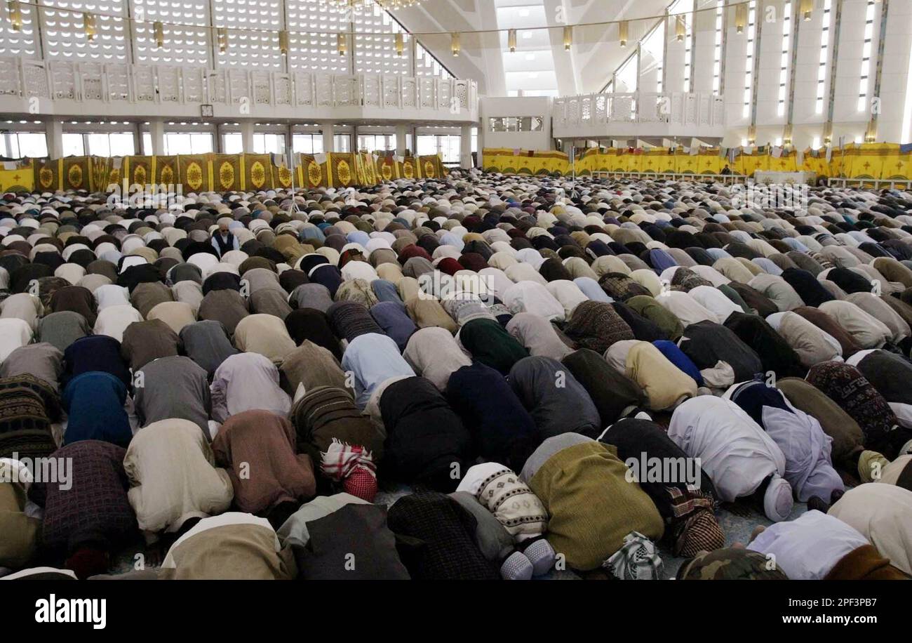 Devoted Muslims offer last Friday prayers of Ramadan at the Faisal ...