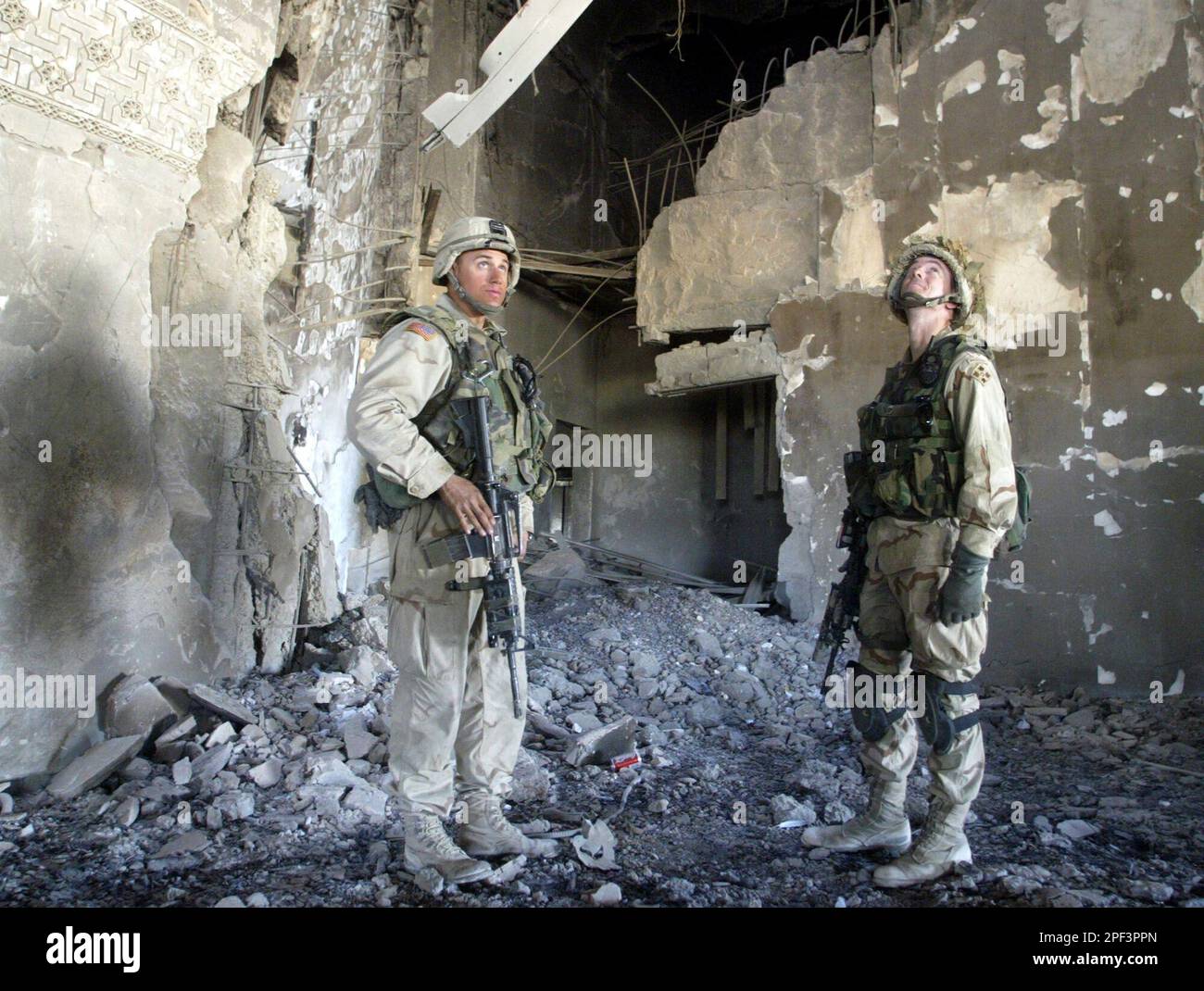 Soldiers from the 1-22 Fourth Infantry Division inspect home of Saddam ...