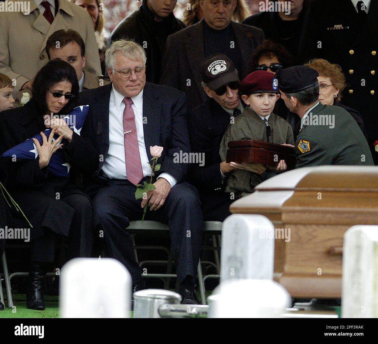 A flag is presented to Marlowe Fletcher, and his stepson, Joshua, 10 ...