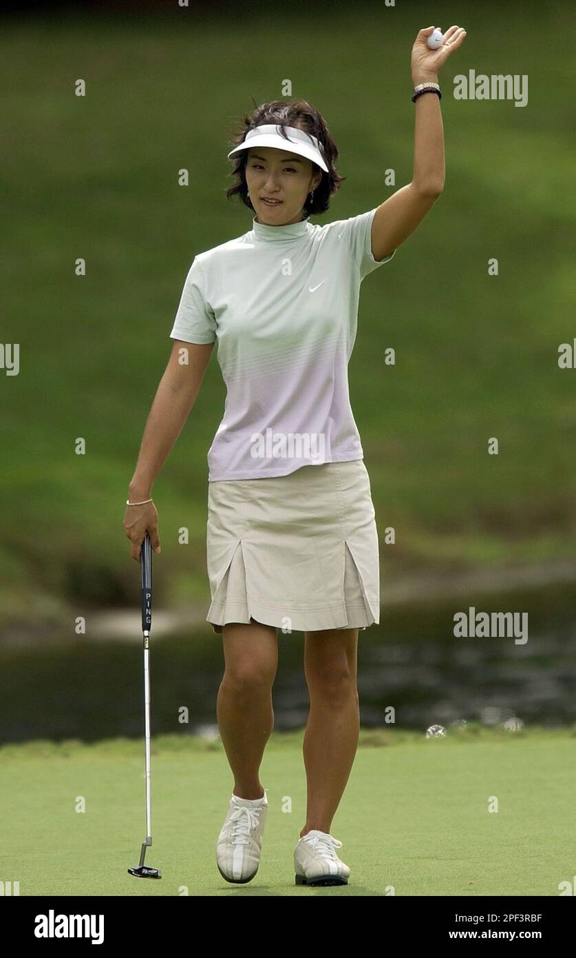 Grace Park waves to fans as she finshed up on the 16th hole Wednesday ...