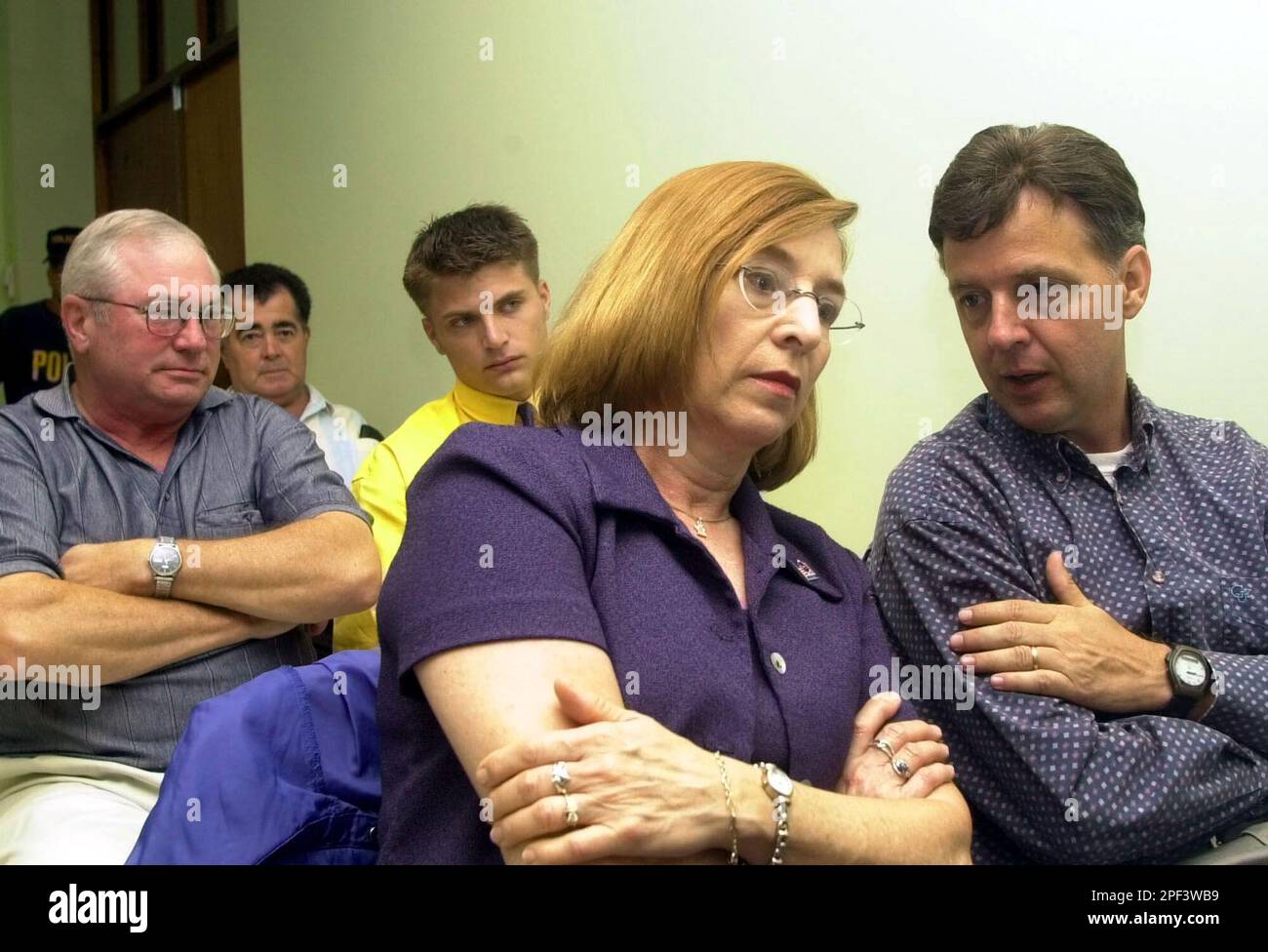 Brad Stauffer, father of Shannon Martin, left, Pete Majerle, legal aid ...