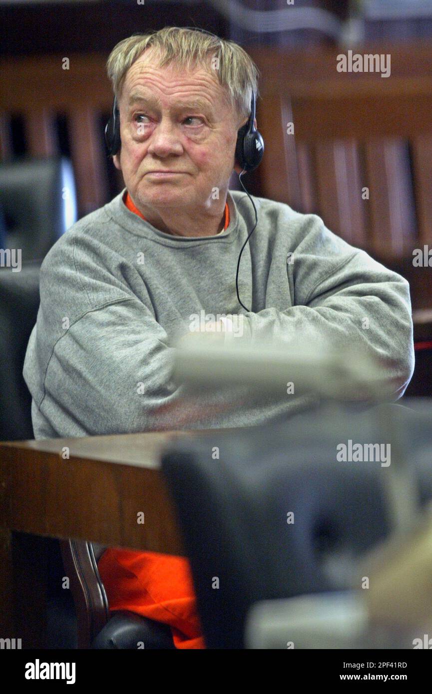 Eric Anderson listens to the first day of his trial in Brockton, Mass ...