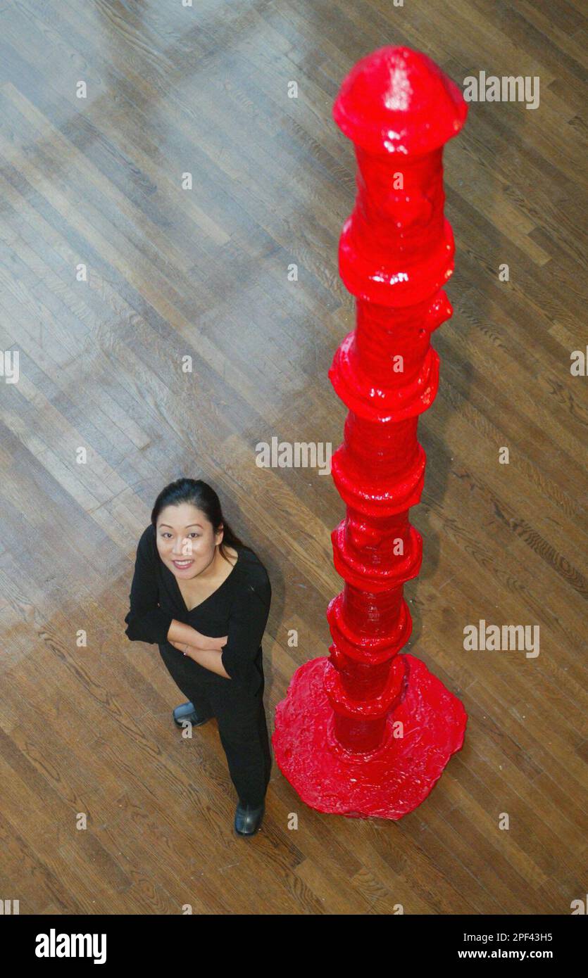 Ran Young Kim of Queens, N.Y., stands next to part of her MFA Thesis ...