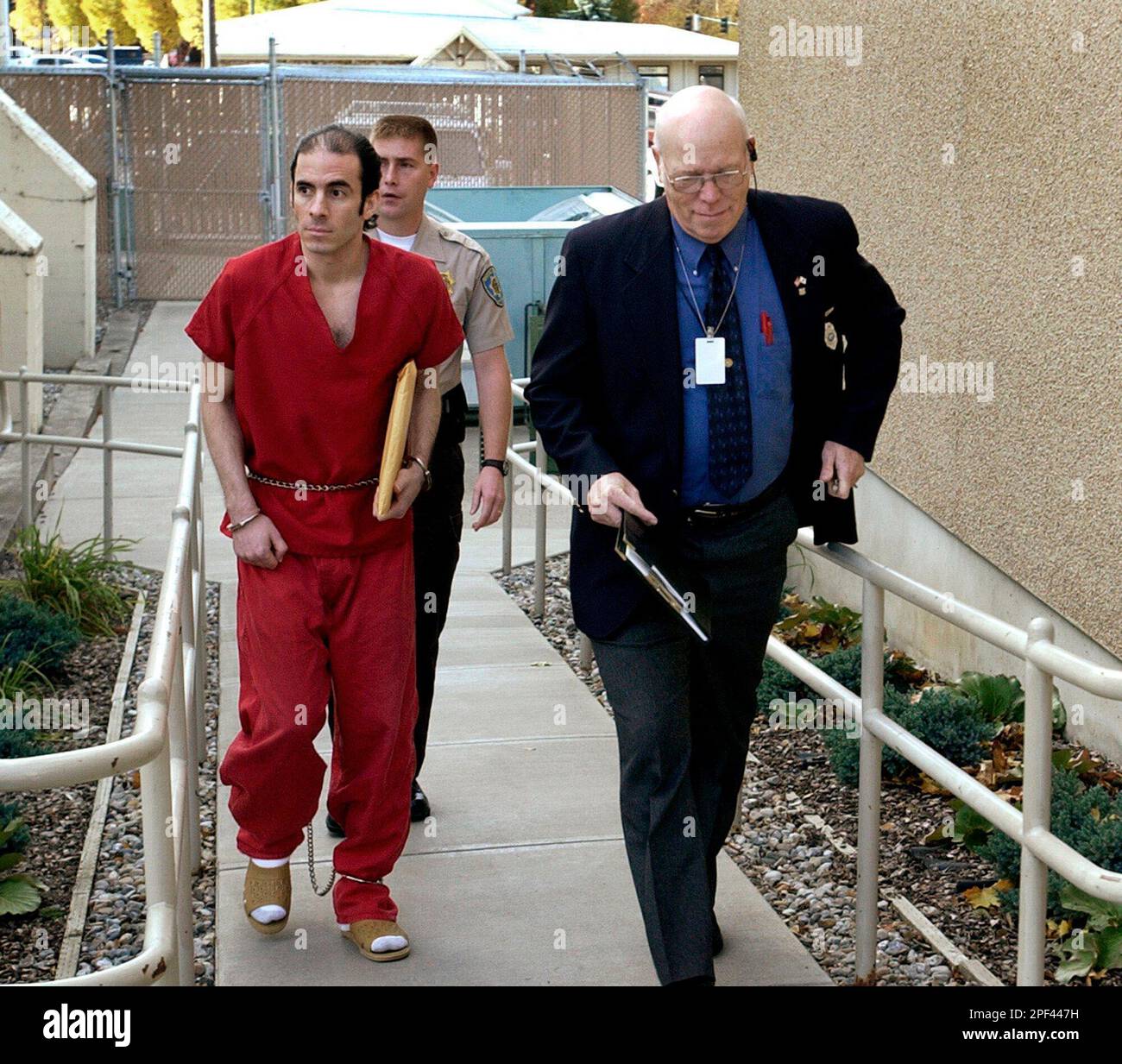 Giovanni Mendiola,left, is escorted to his sentencing hearing Wednesday ...