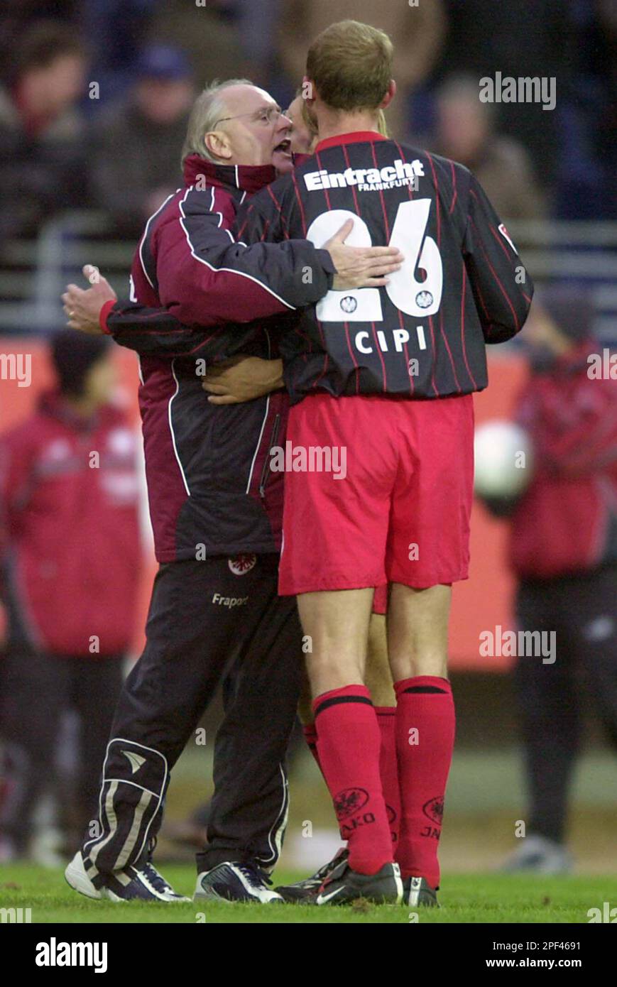 Coach Willi Reimann and Geri Cipi, right, of Eintracht Frankfurt react ...