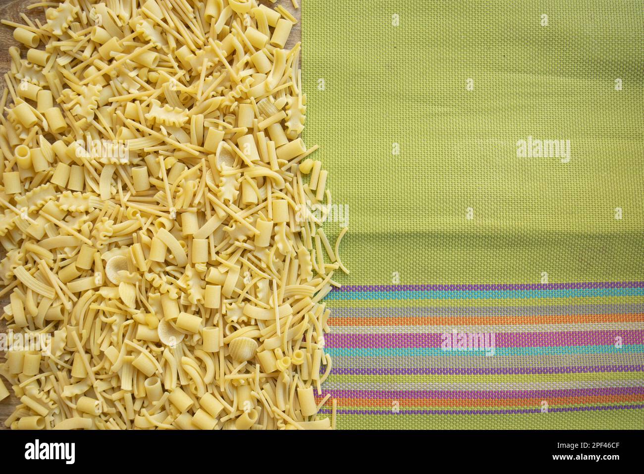raw pasta assortment with half empty space Stock Photo - Alamy