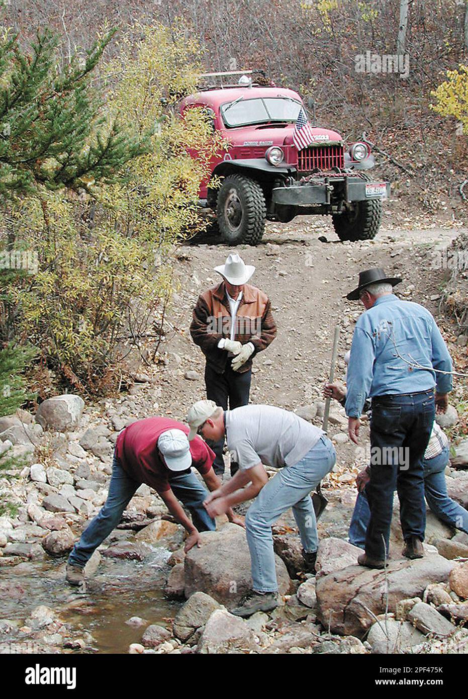 ** FILE ** Nevada Assemblyman John Carpenter, in white cowboy hat, puts ...