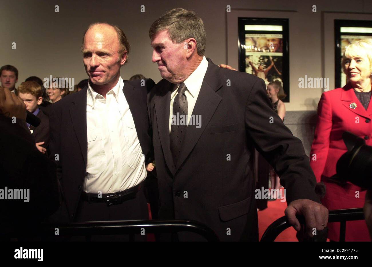Actor Ed Harris, left, and former T.L. Hanna High School football coach ...