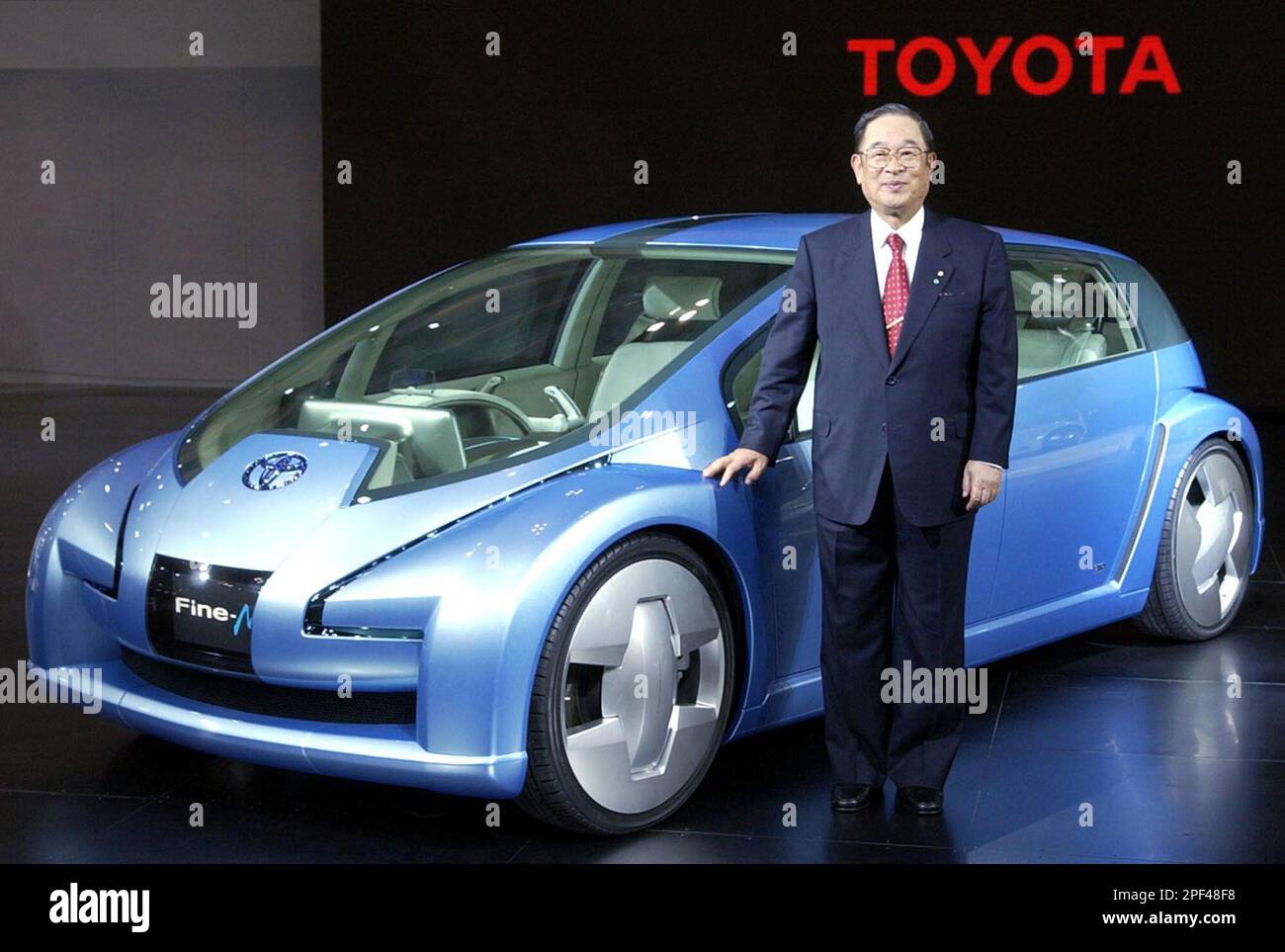 Toyota Motor Corp. President Fujio Cho poses with Fine-N (Fuel cell ...
