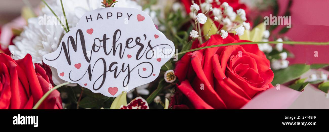 Happy Mothers Day text on gift card with flower bouquet of roses ...