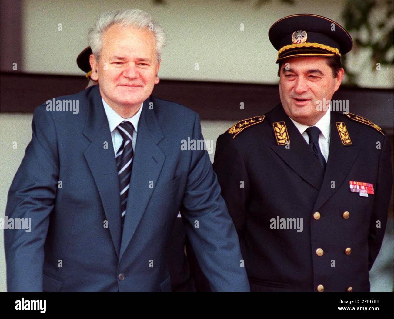 ** FILE ** Former Yugoslav Presidens Slobodan Milosevic,left, and ...