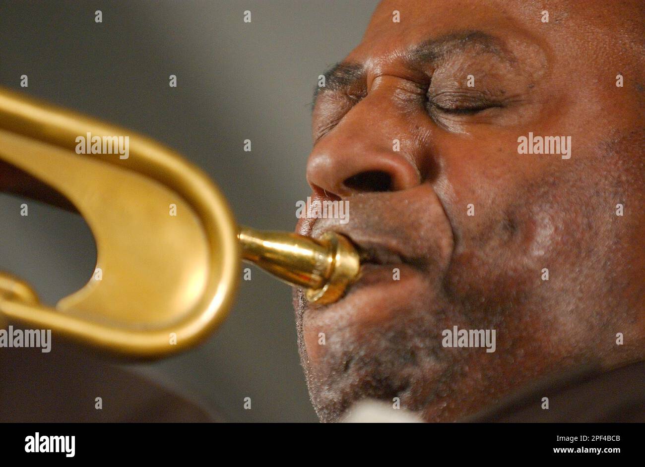 Trumpet player Joey Morant plays at the ceremony as Loius "Satchmo ...