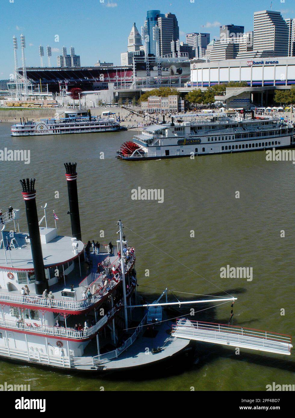 Riverboats cruise on the Ohio River in downtown Cincinnati, during the ...