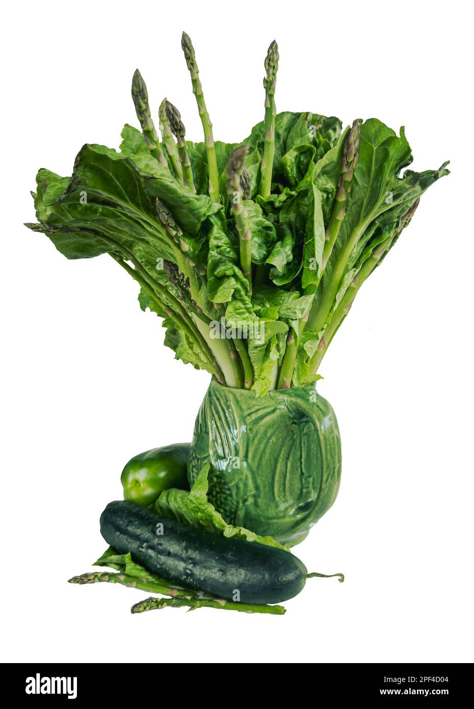 Isolated Fresh green vegetables display in antique pitcher bouquet ...